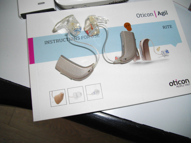 Oticon hearing aid with a Free streamer - Just plug it in your TV amp ...